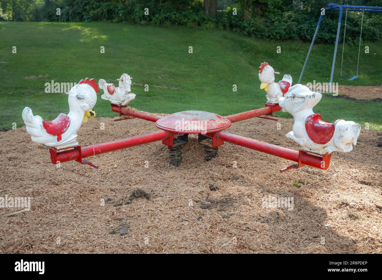 Old park playground spring rocker, rocking, equipment Stock Photo - Alamy