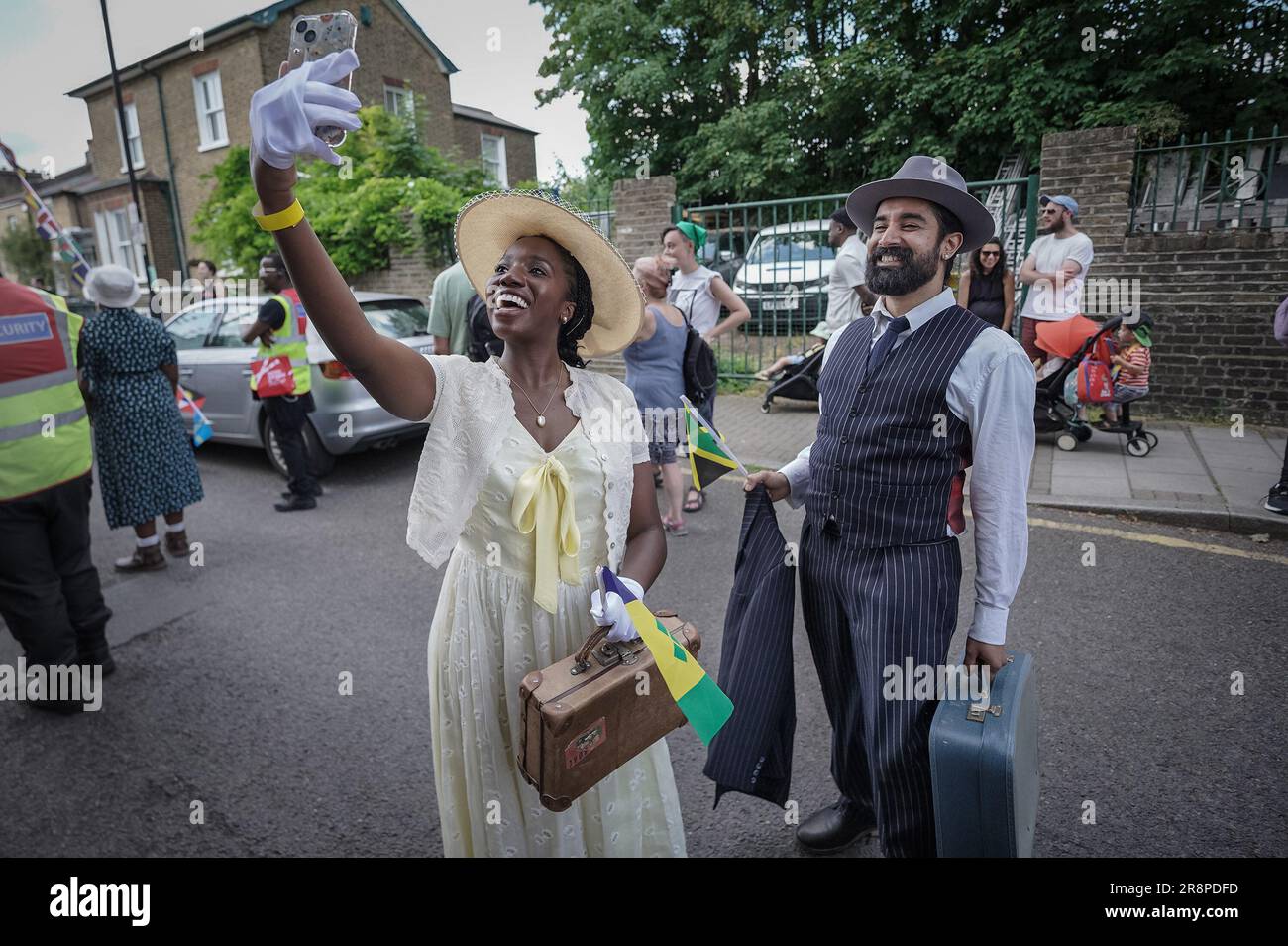 London, UK. 22nd June 2023. Windrush 75: Procession. Local residents ...