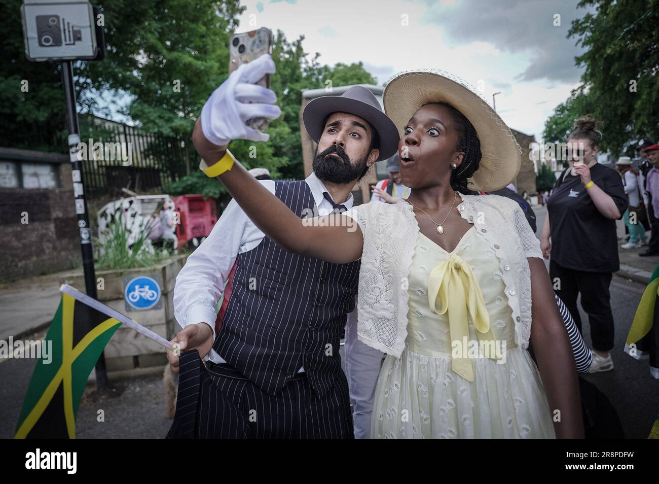 London, UK. 22nd June 2023. Windrush 75: Procession. Local residents ...
