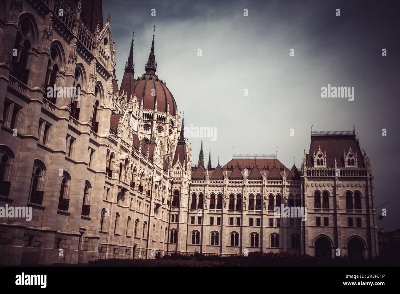 A large and impressive building with a clock adorning its facade Stock ...