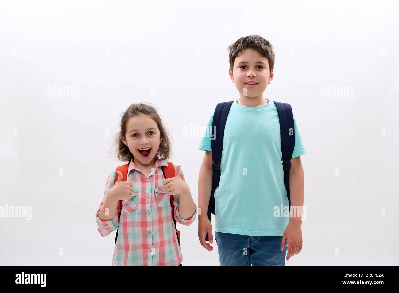 Cheerful school kids, kid girl and teen boy expressing positive ...