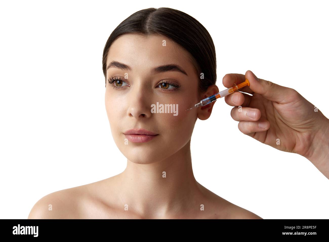 Portrait of young woman taking care after skin, doing cosmetological ...