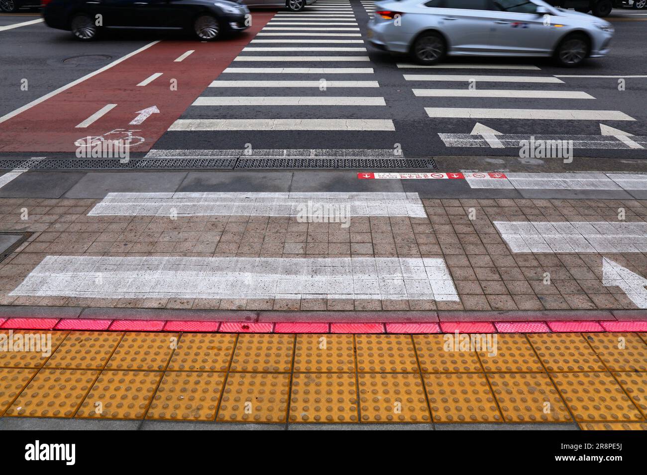 Bicycle path crossing and pedestrian crossing in Seoul, South Korea ...