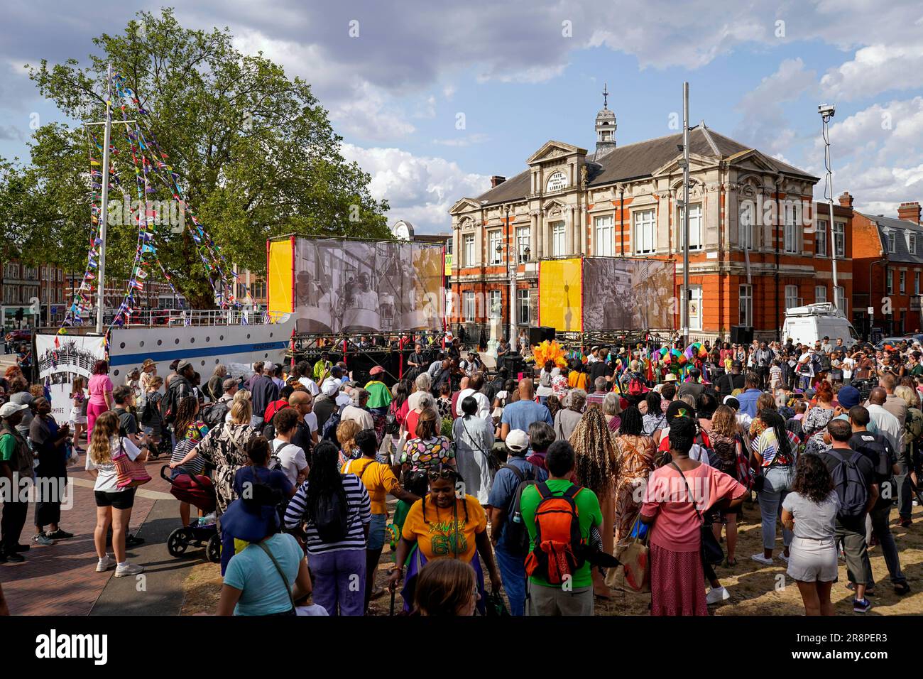 People gather after the procession that commemorates the Windrush Day ...