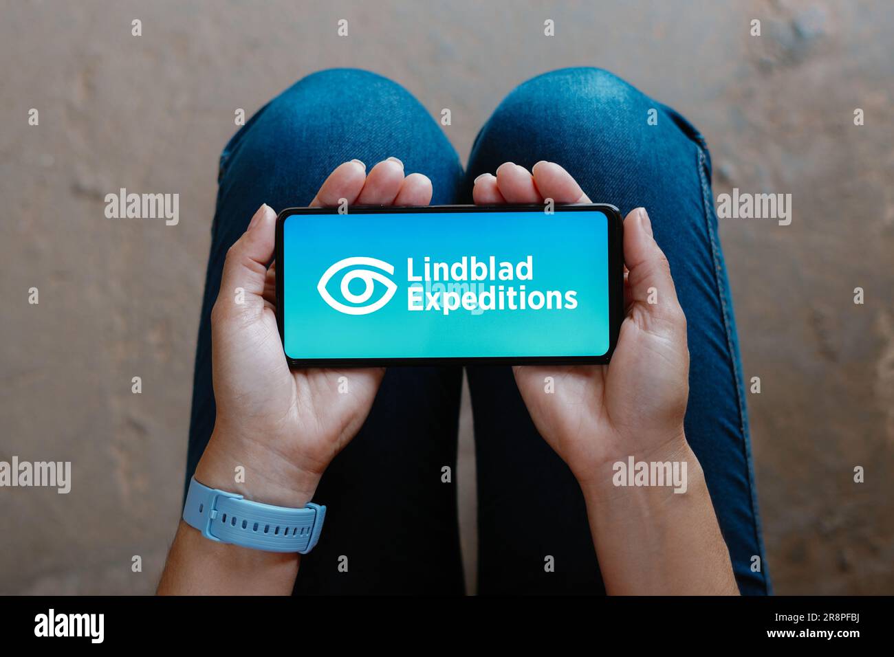 In this photo illustration, the Lindblad Expeditions logo is displayed ...