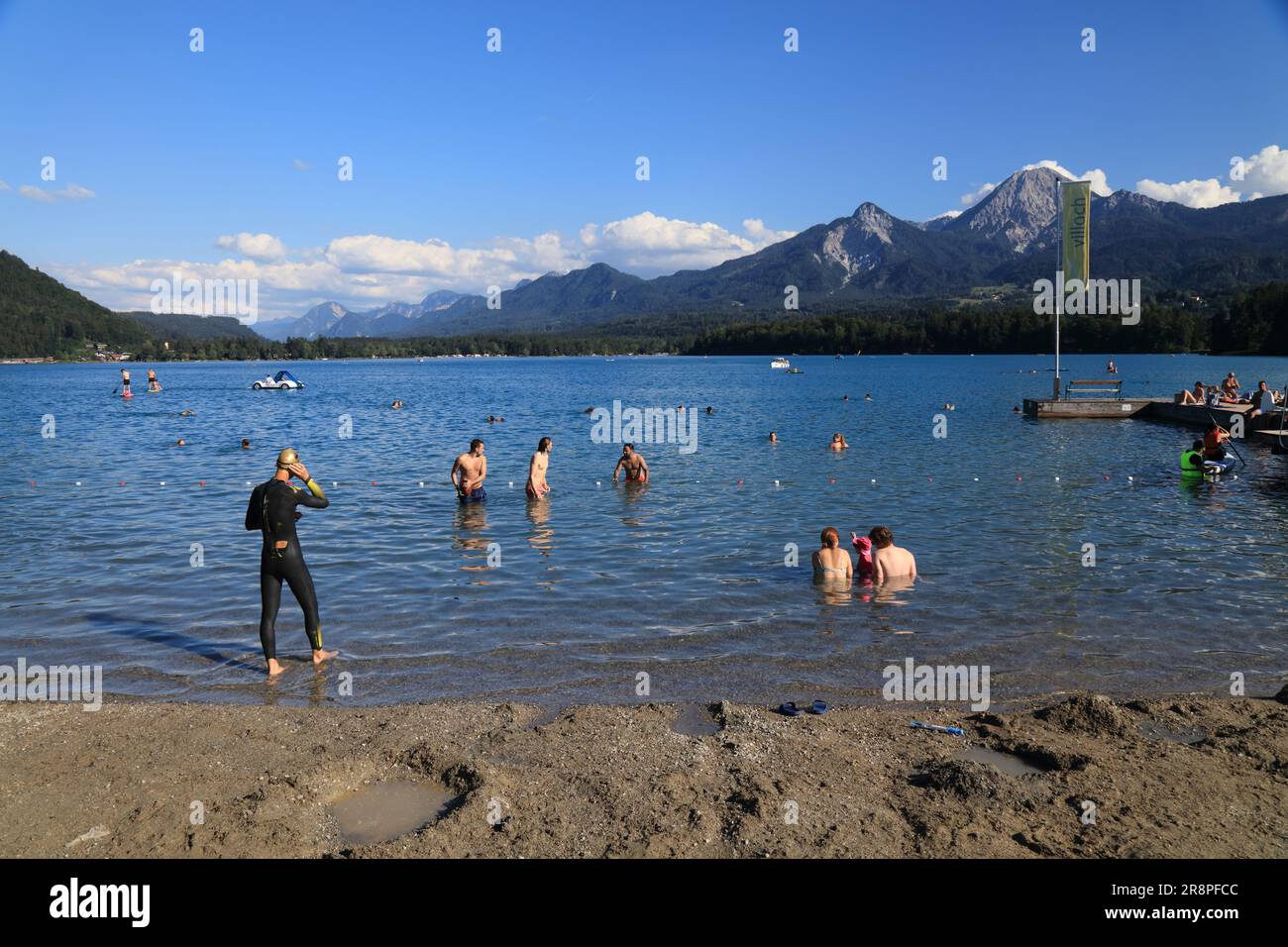 CARINTHIA, AUSTRIA - AUGUST 10, 2022: Tourists enjoy the summer at Lake ...