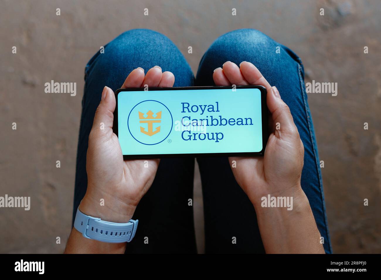 In this photo illustration, the Royal Caribbean Group logo is displayed ...