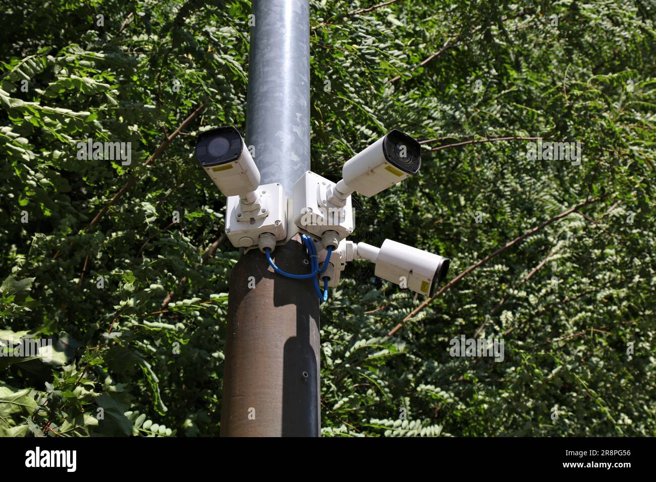 Security cameras - generic CCTV equipment in a park in Austria ... Security cameras - generic CCTV equipment in a park in Austria ...