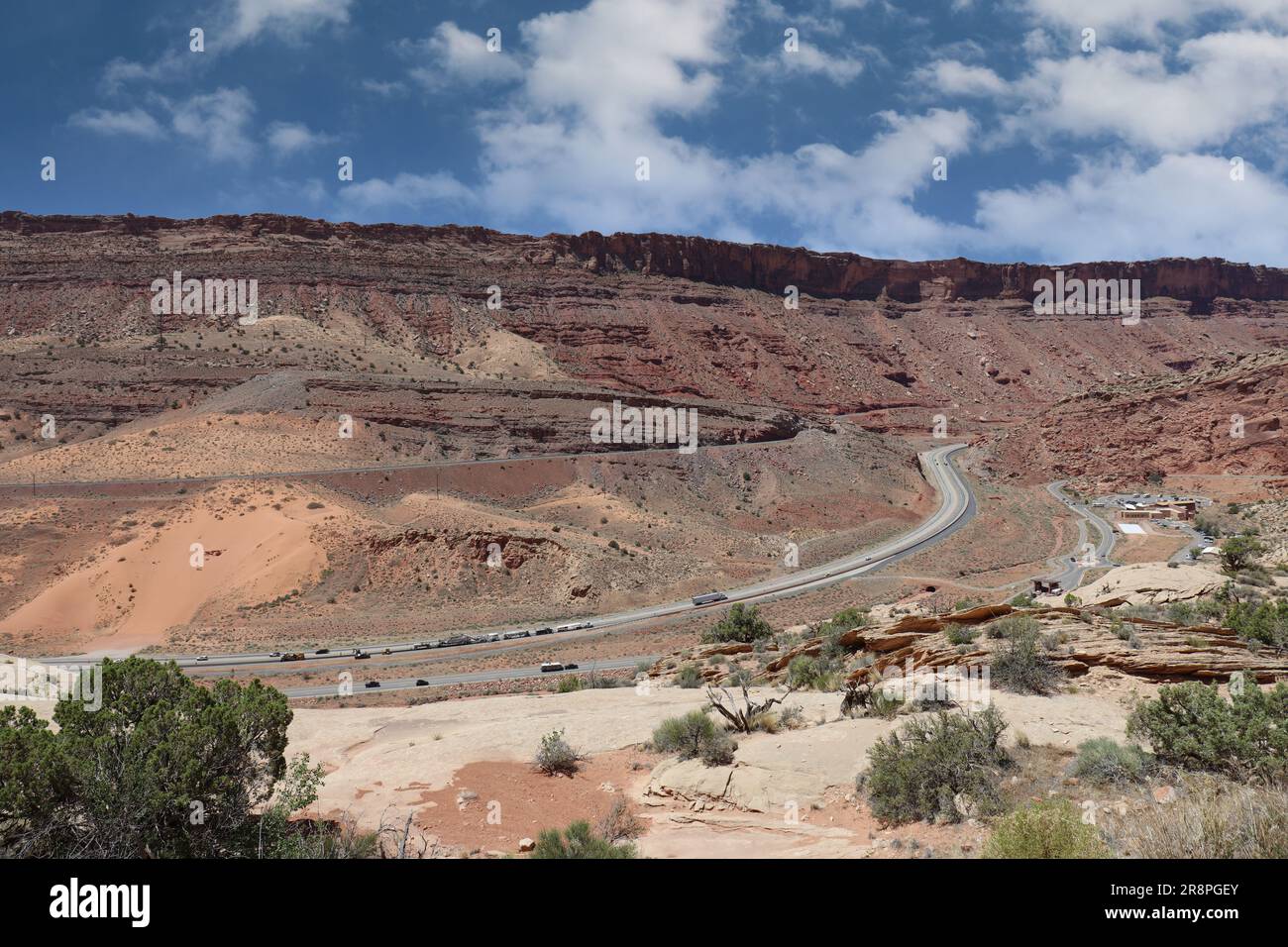 The Moab Fault line stretching across wingate sandstone mountains above ...