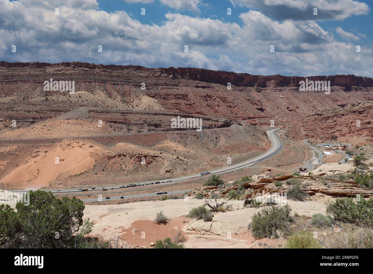 The Moab Fault line stretching across wingate sandstone mountains above ...