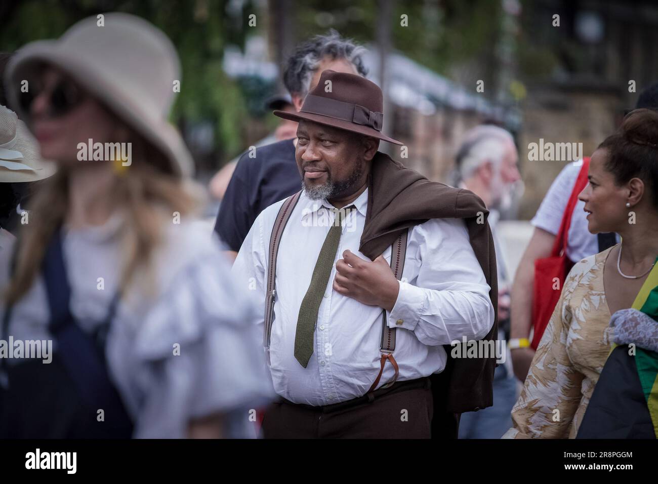 London, UK. 22nd June 2023. Windrush 75: Procession. Local residents ...
