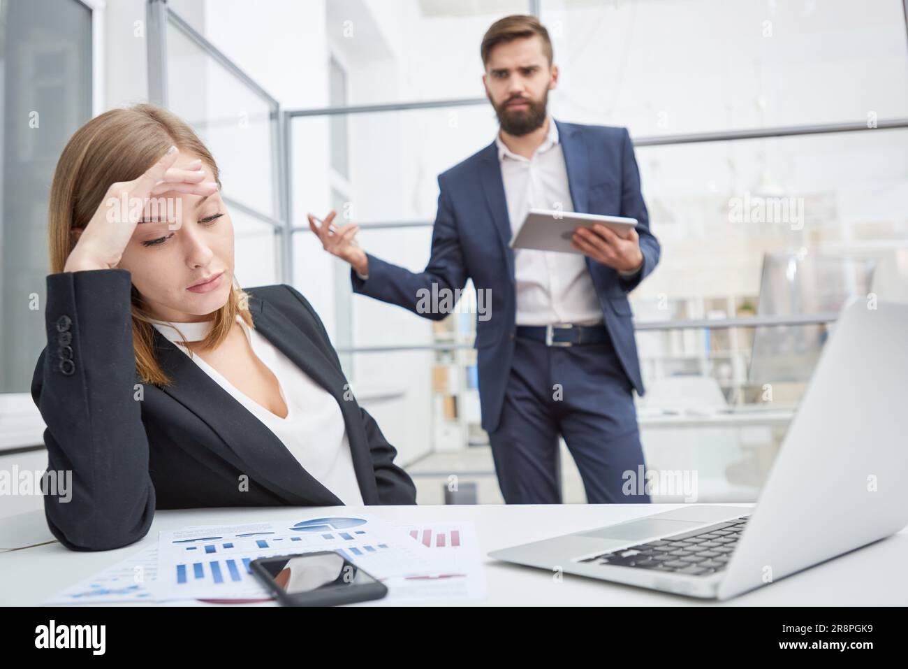 Angry displeased employer unsatisfied with employees work and berating ...