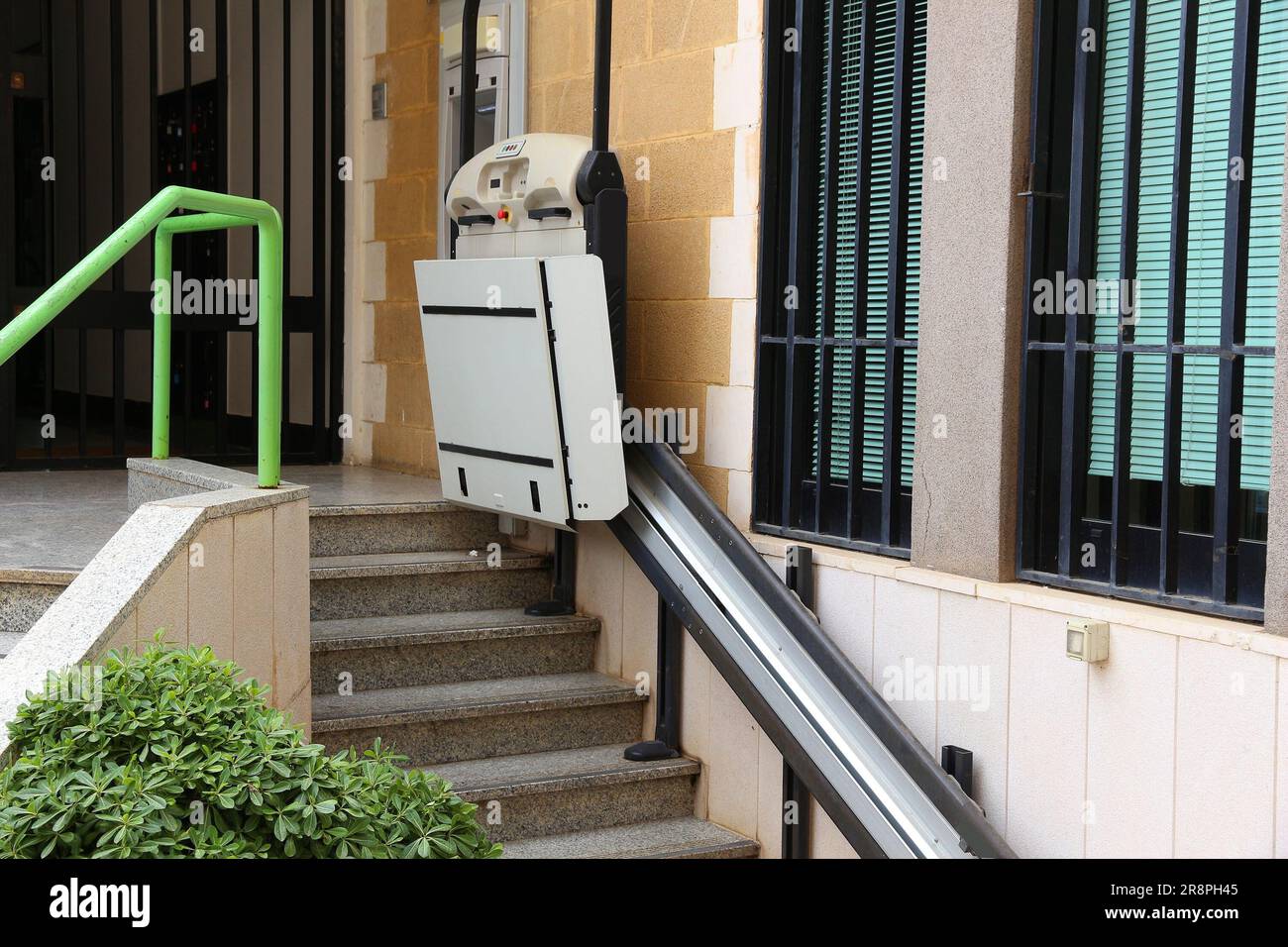 Disability infrastructure. Mobility lift to help wheelchair users use ...