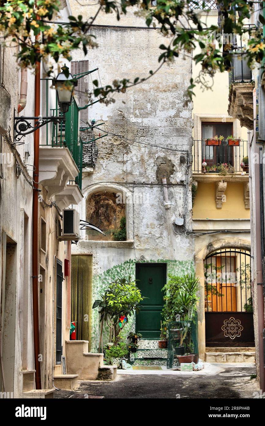 Grottaglie, Italy - typical town street with colorful Mediterranean ...
