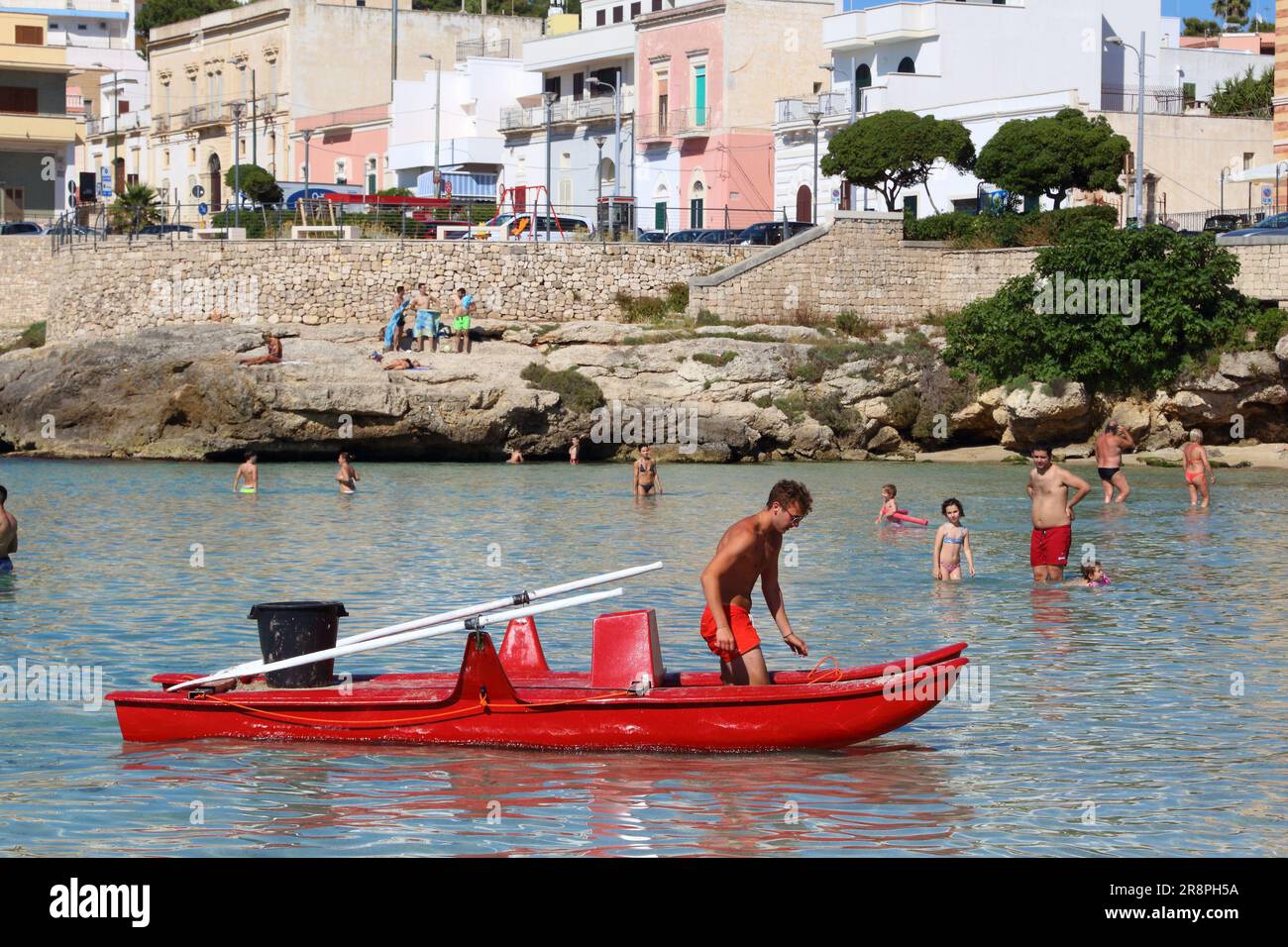 APULIA, ITALY - MAY 30, 2017: Beachgoers visit Santa Maria Al Bagno ...