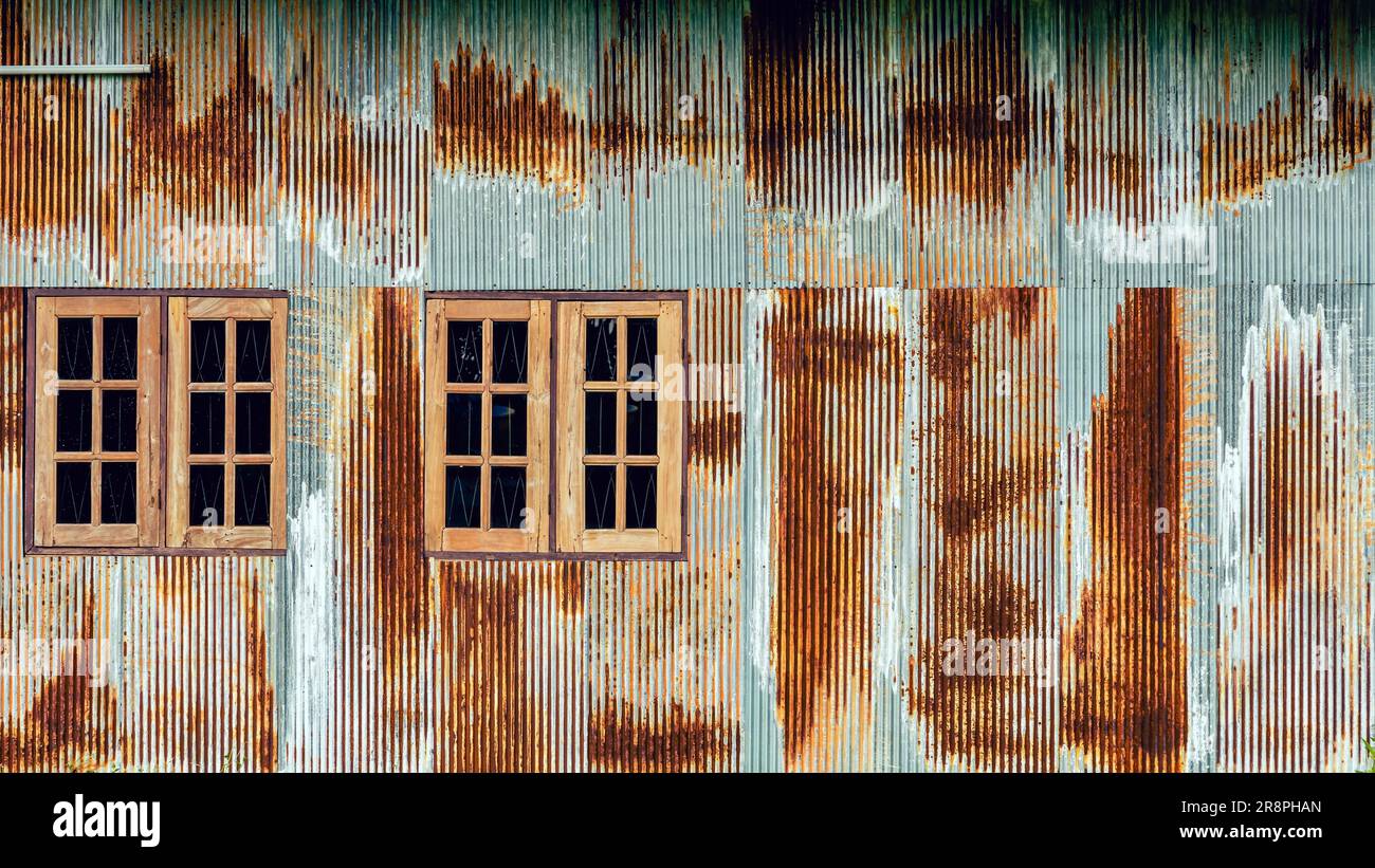 Facade house with old zinc wall. Beautiful vintage galvanized sheet ...