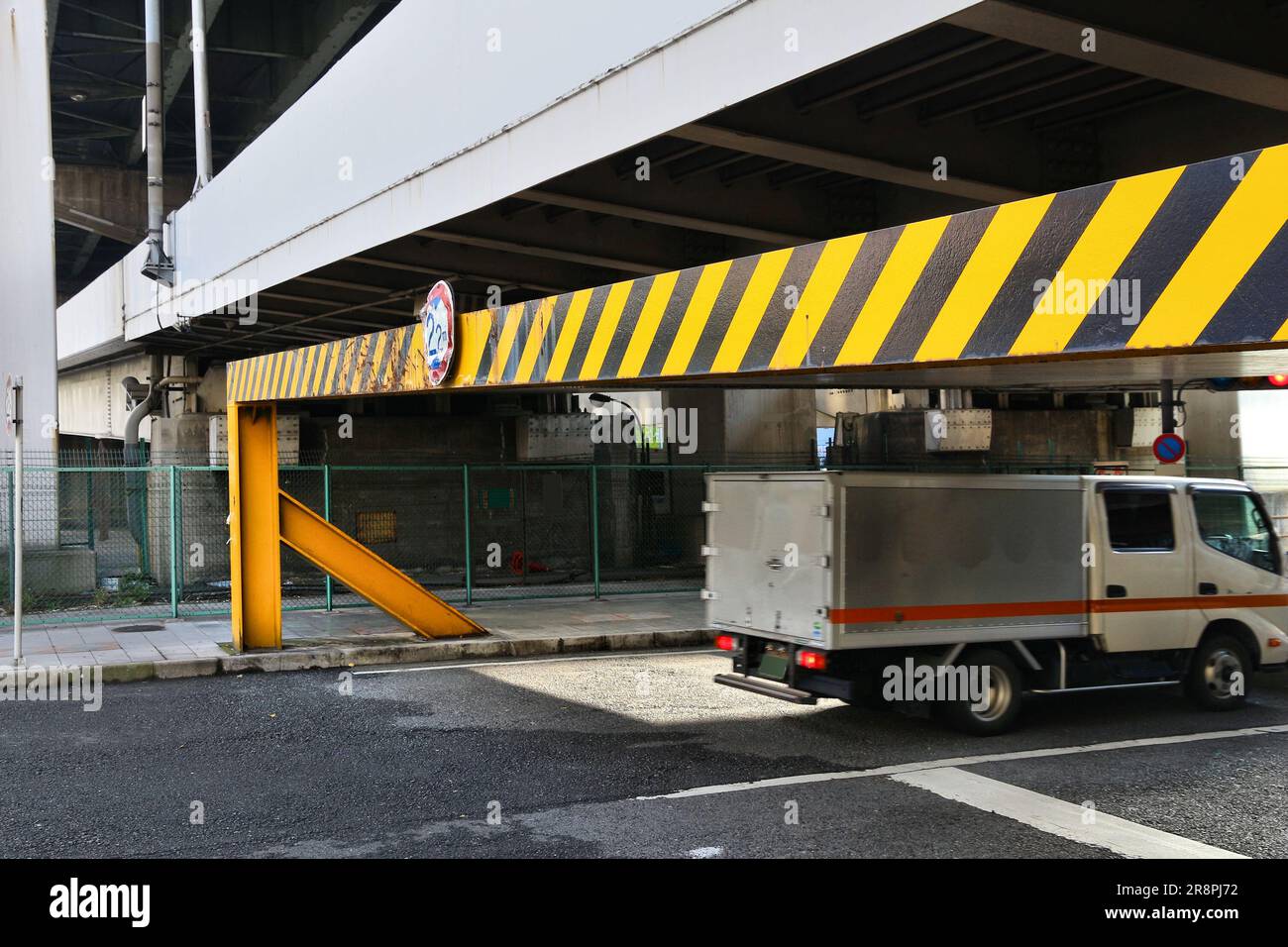 Low clearance railway viaduct in Osaka, Japan. Railway bridge ...