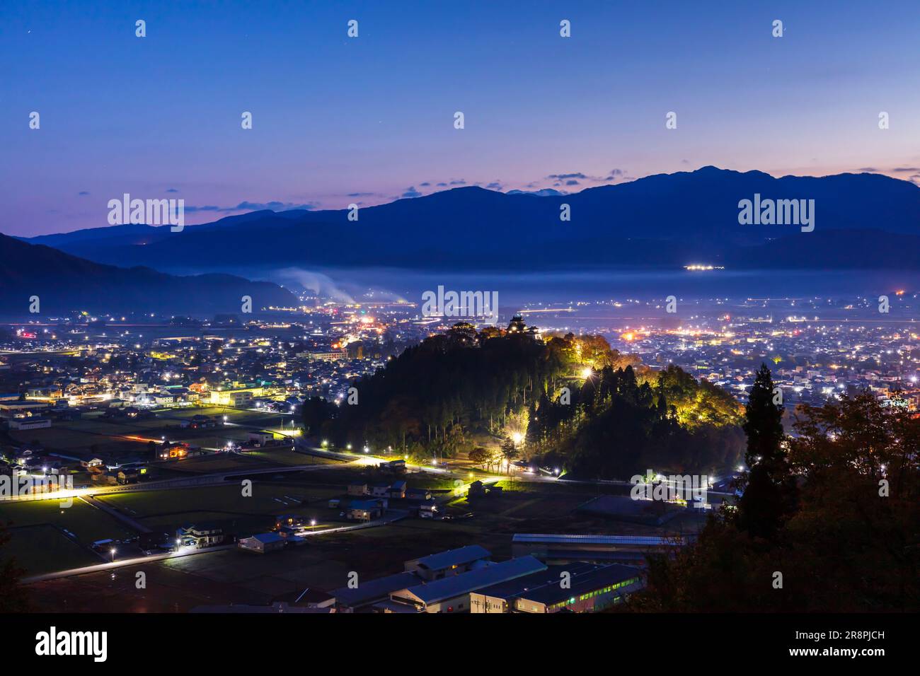 Echizen-Ono Castle and the night view of Ono City Stock Photo - Alamy
