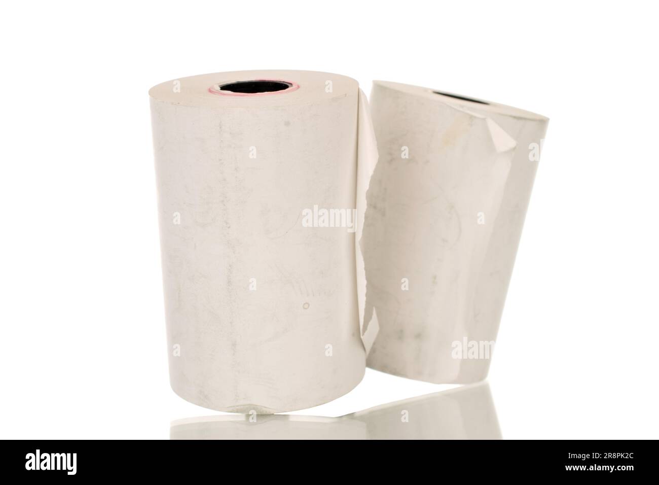 Two rolls of paper cash register tape, close-up isolated on white ...
