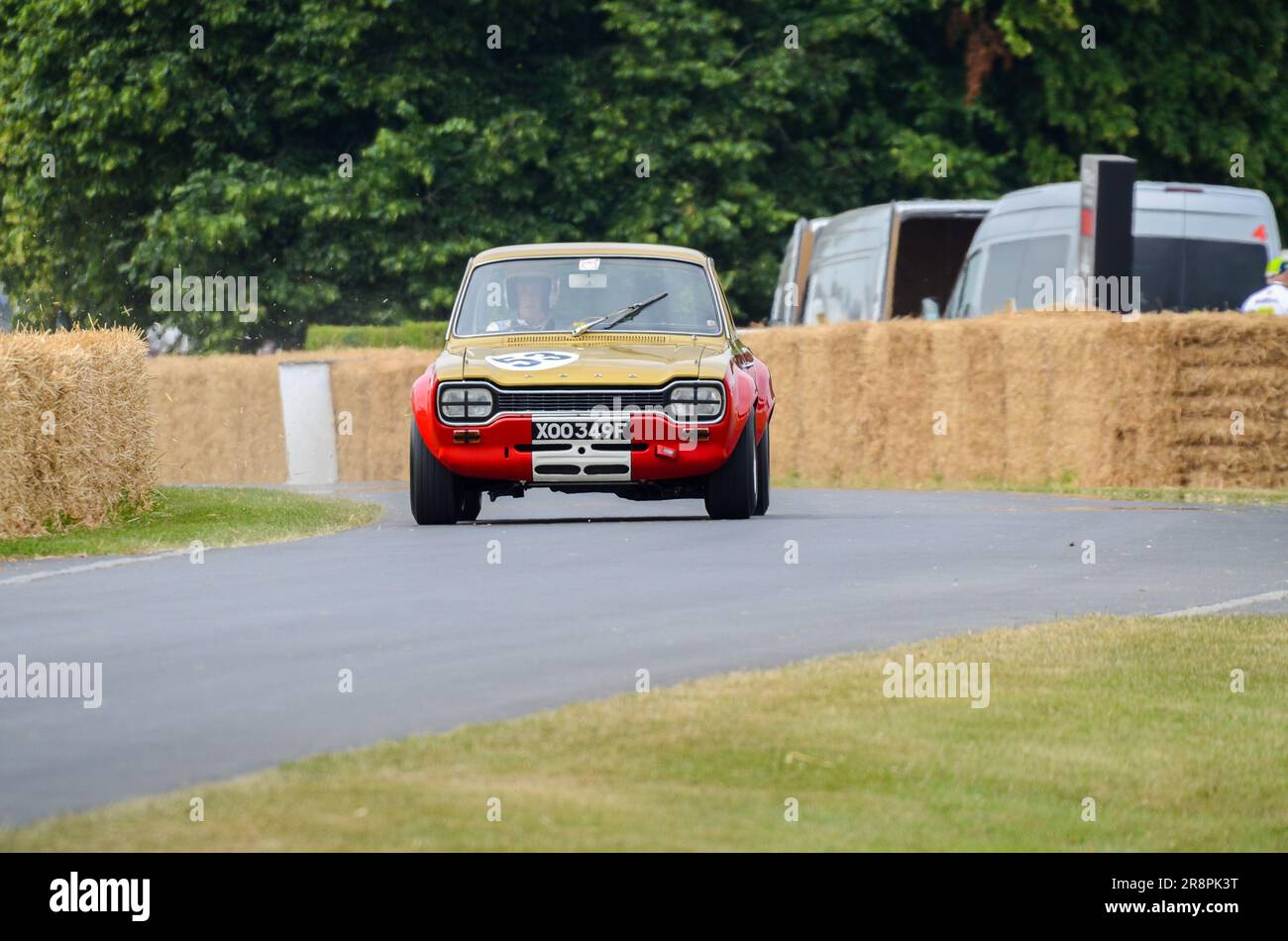 Ford Escort Mk1 race car racing up the hill climb at the Goodwood ...