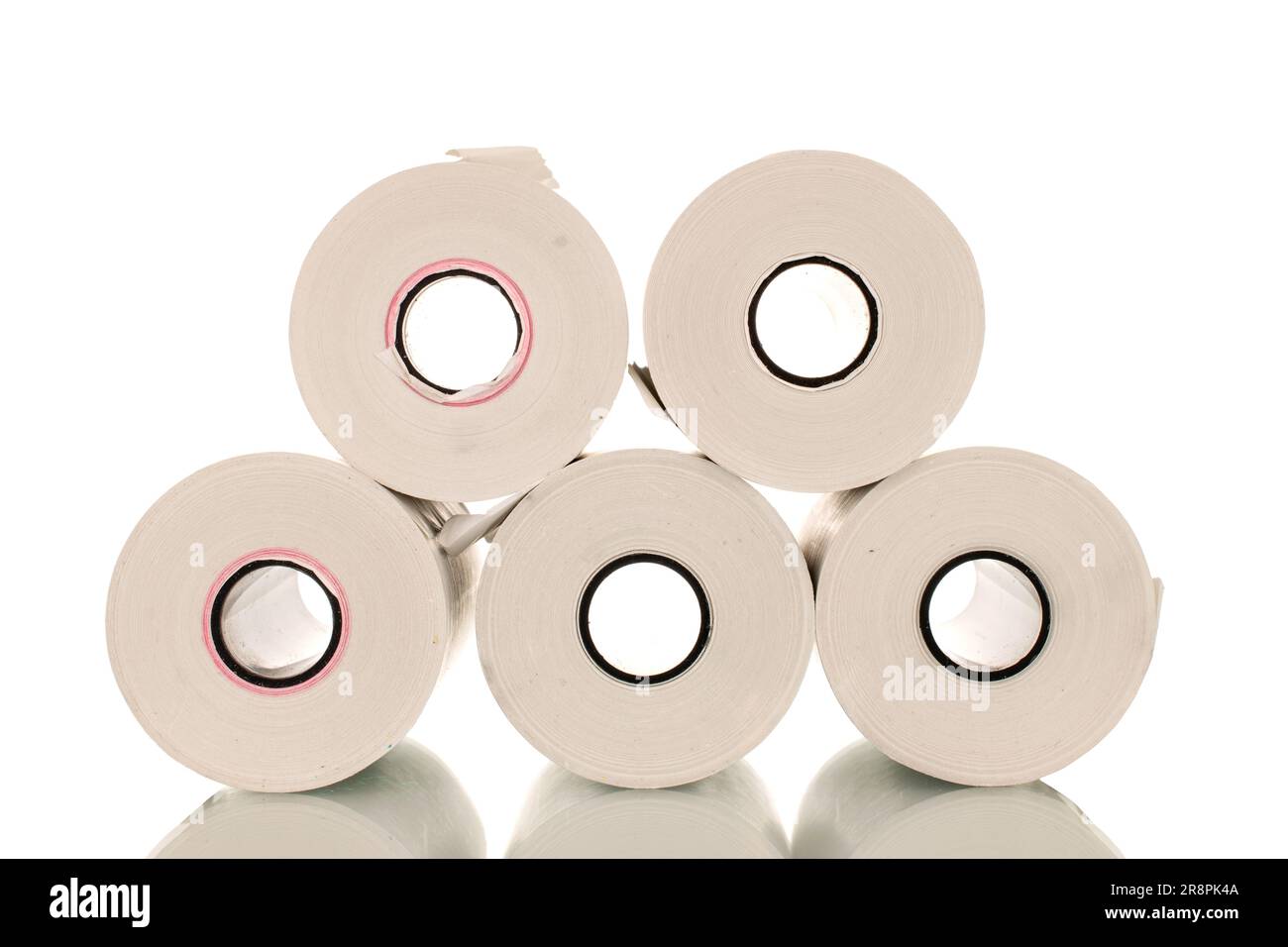 Several rolls of paper cash register tape, close-up isolated on white ...