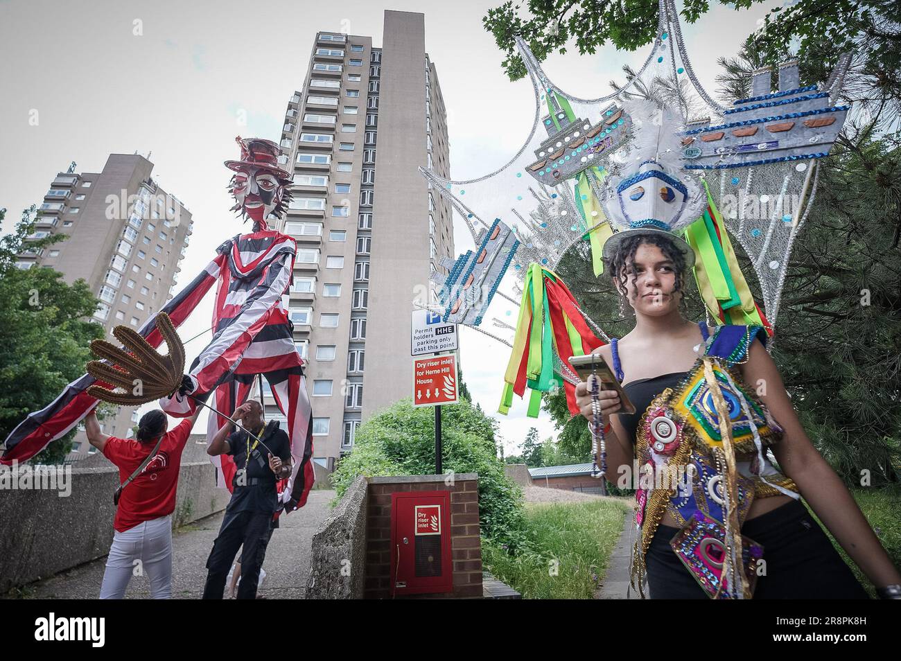 London, UK. 22nd June 2023. Windrush 75: Procession. Locals get ...
