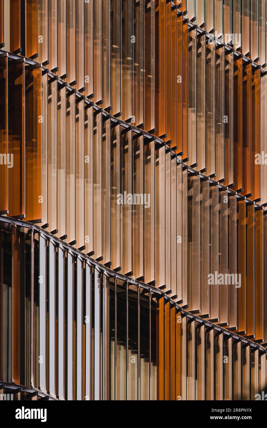 The colored facade of a building in Barcelona adds a touch of charm and ...