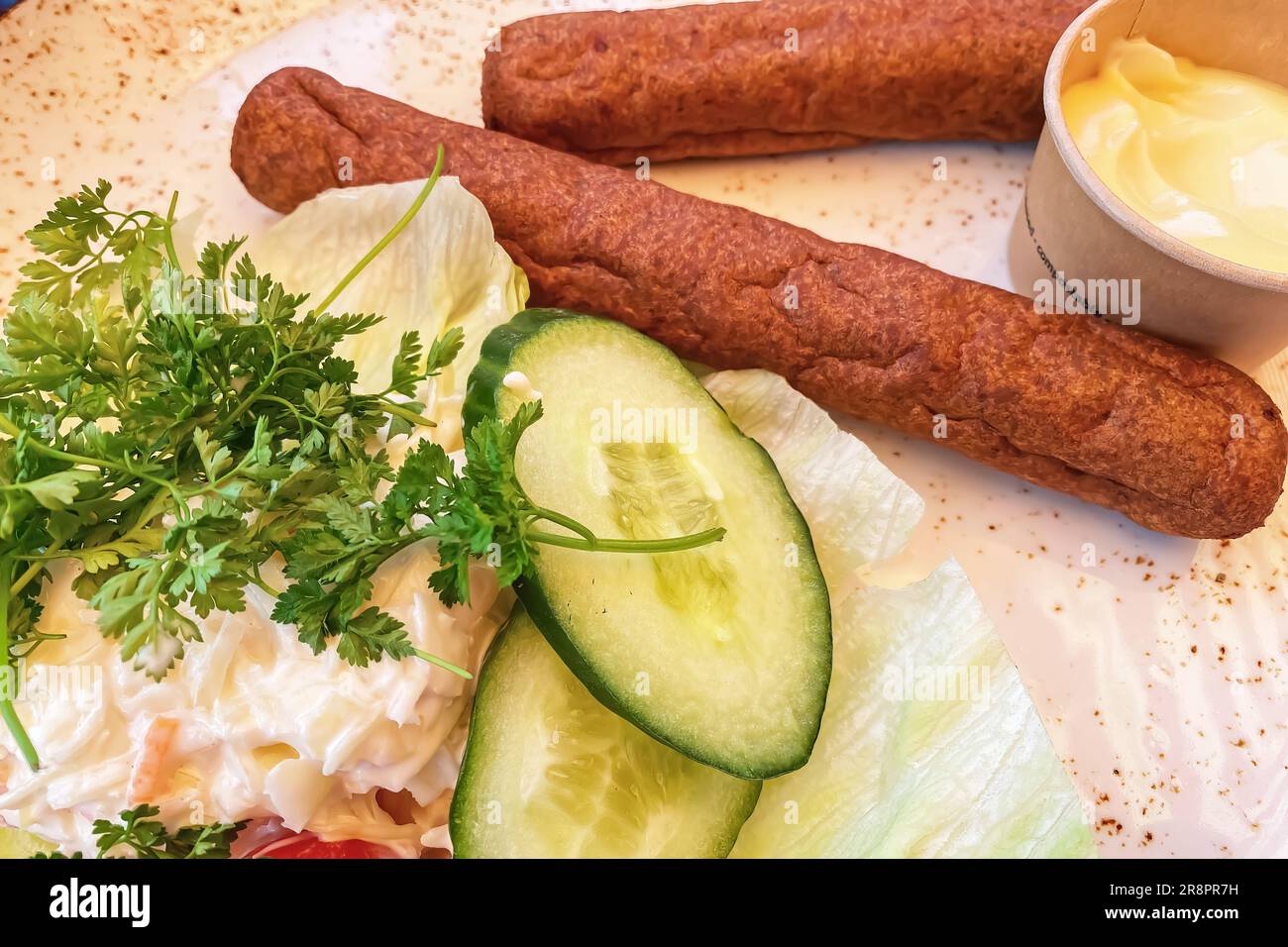 Traditional typical dutch fried snack, minced meat Frikandel sausage on ...