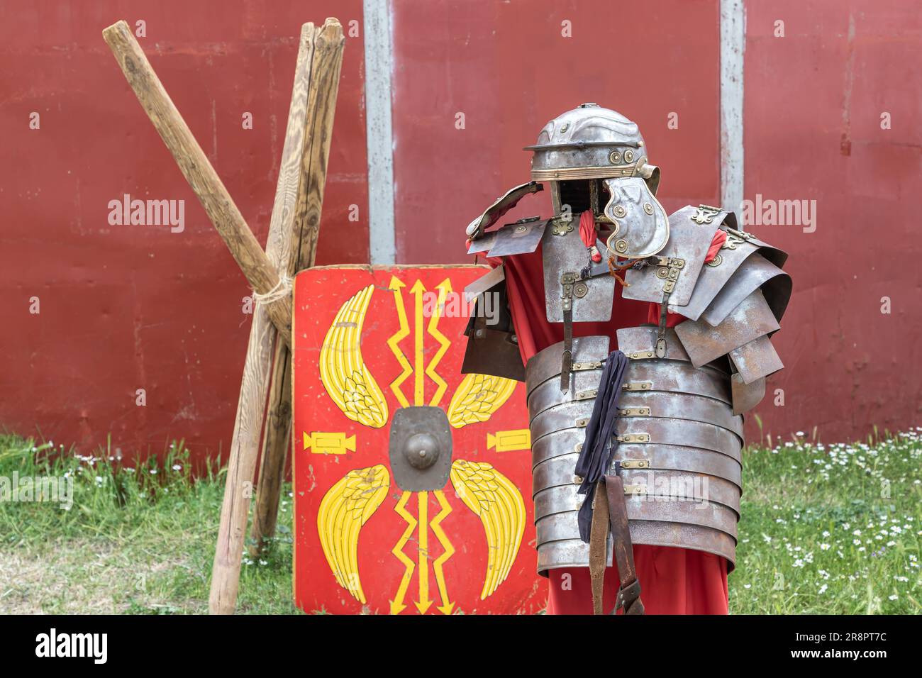 outdoor scene in horizontal view of armor, helmet, tunic, belt and ...
