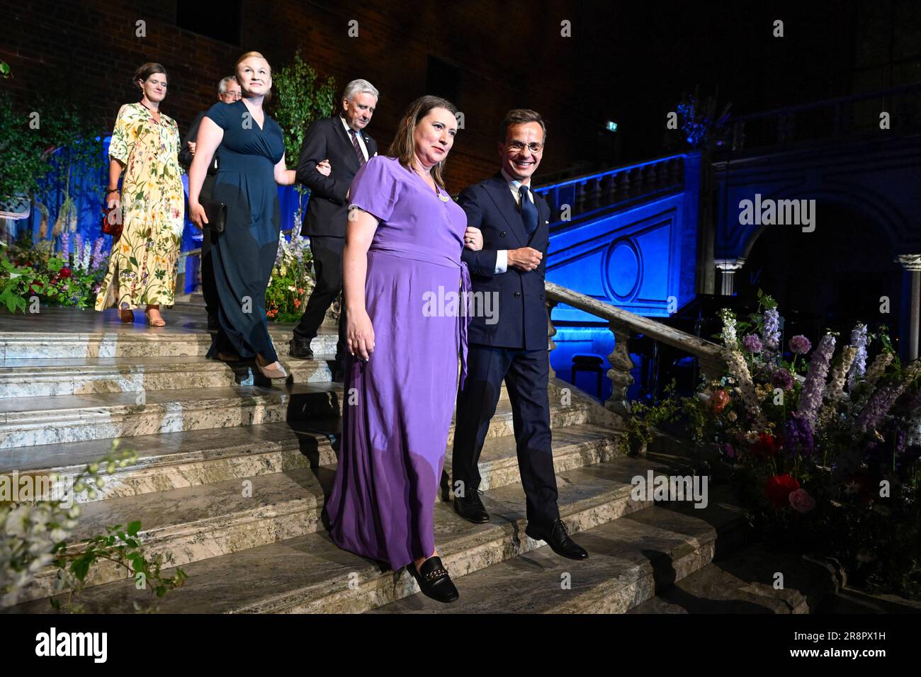 Speaker Andreas Norlén escorts Second-Vice Chairman Sara Stenudd as ...