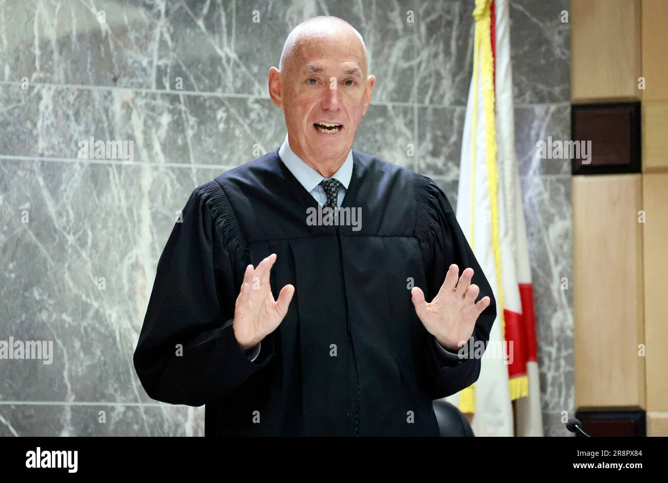 Broward Circuit Judge John J. Murphy lll speaks as he presides over the double murder trial for ...