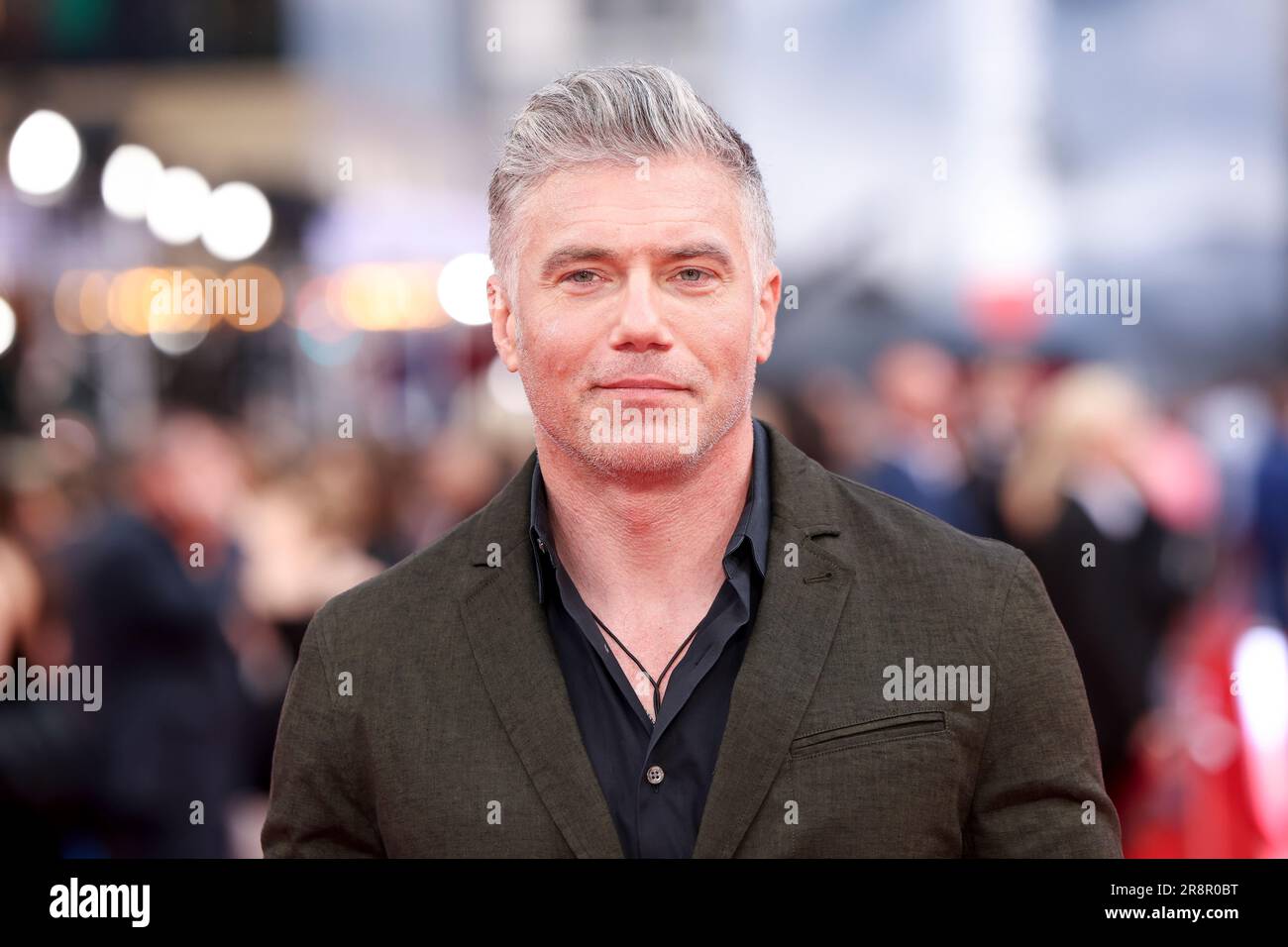 Anson Mount poses for photographers upon arrival at the premiere of the ...