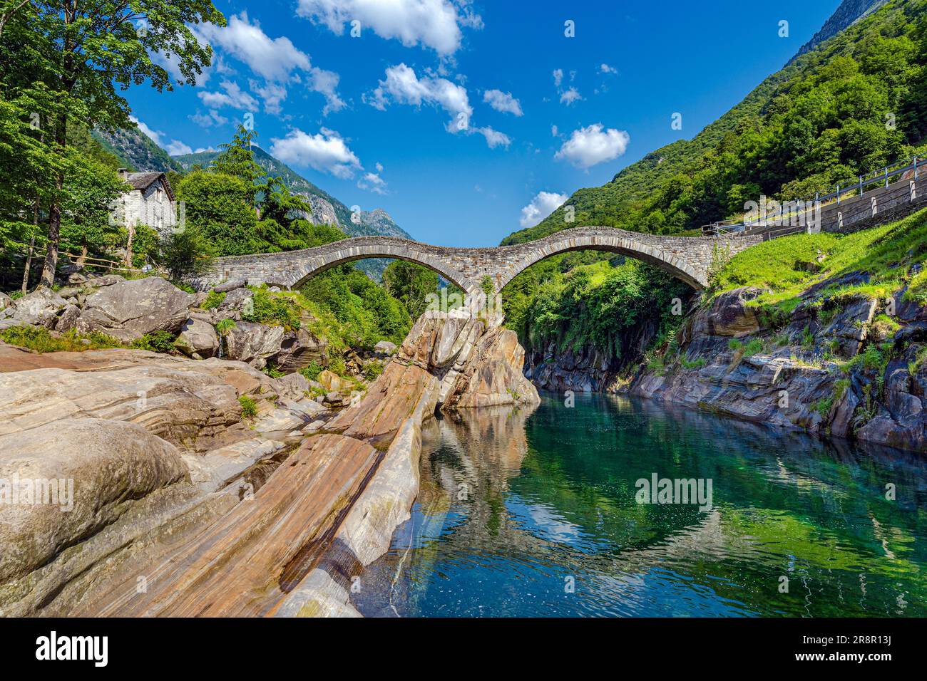 Roman bridge (Ponte dei Salti) crossing the Verzasca River at ...