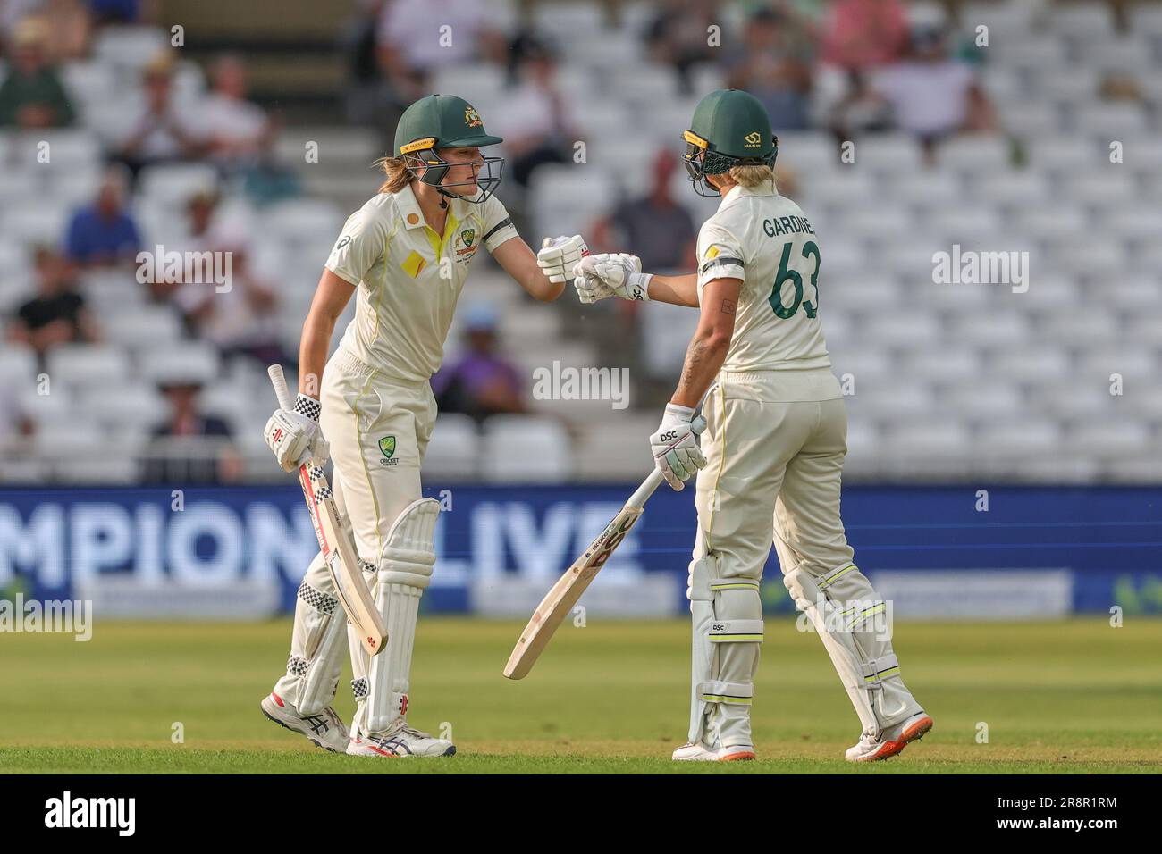 Annabel Sutherland of Australia bumps fists with Ashleigh Gardner of ...