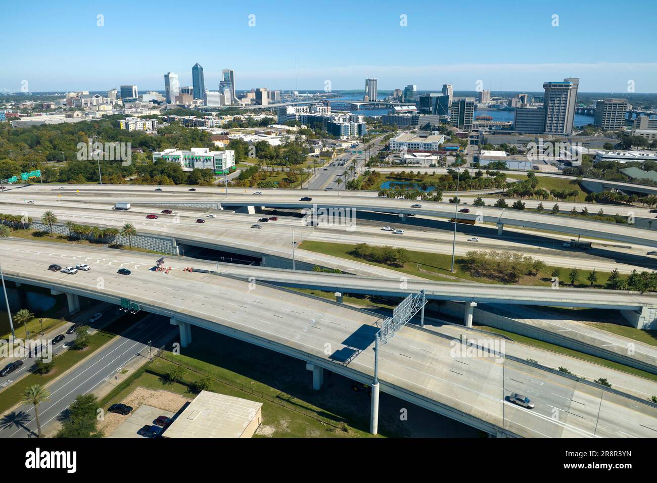 Aerial view of american freeway intersection with fast moving cars and ...