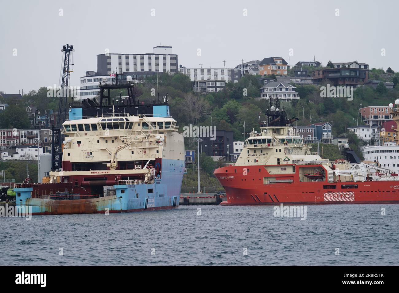 Ships moored at the Port of St. John's in Newfoundland, Canada as ...