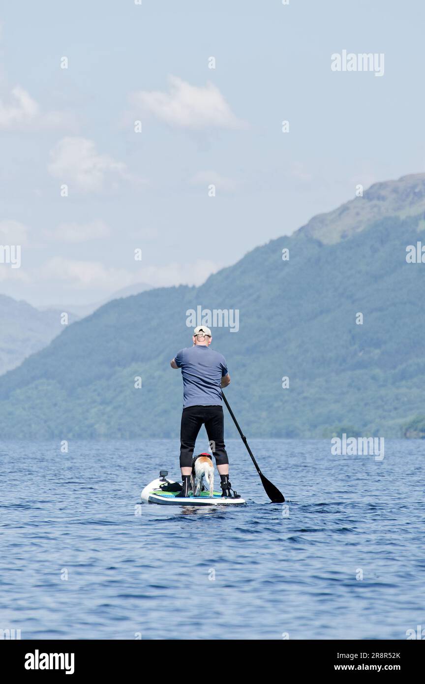Man paddleboarding mountains hi-res stock photography and images - Alamy