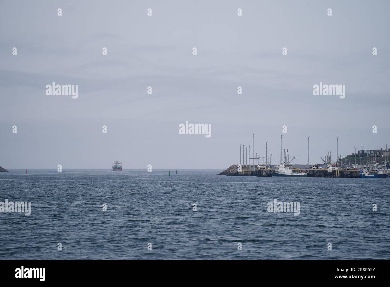 Ships moored at the Port of St. John's in Newfoundland, Canada as ...