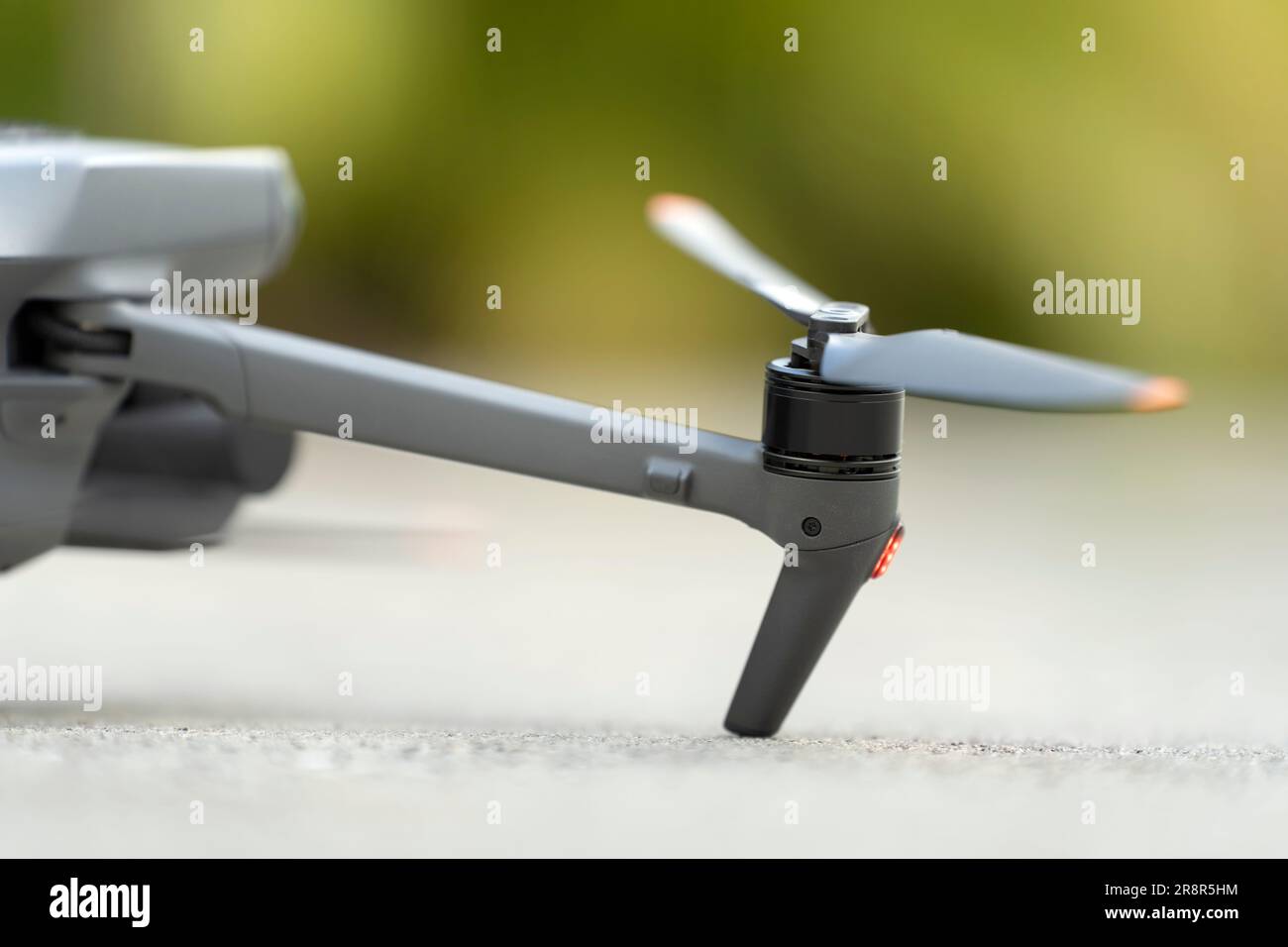 Closeup of motor and propeller of drone quadcopter for taking video and ...