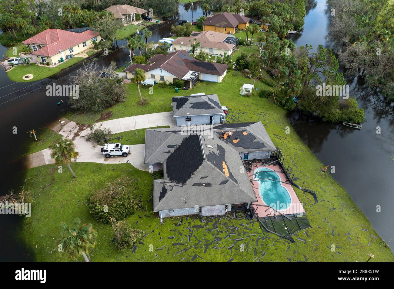 Destroyed house roof by hurricane Ian strong winds in Florida ...