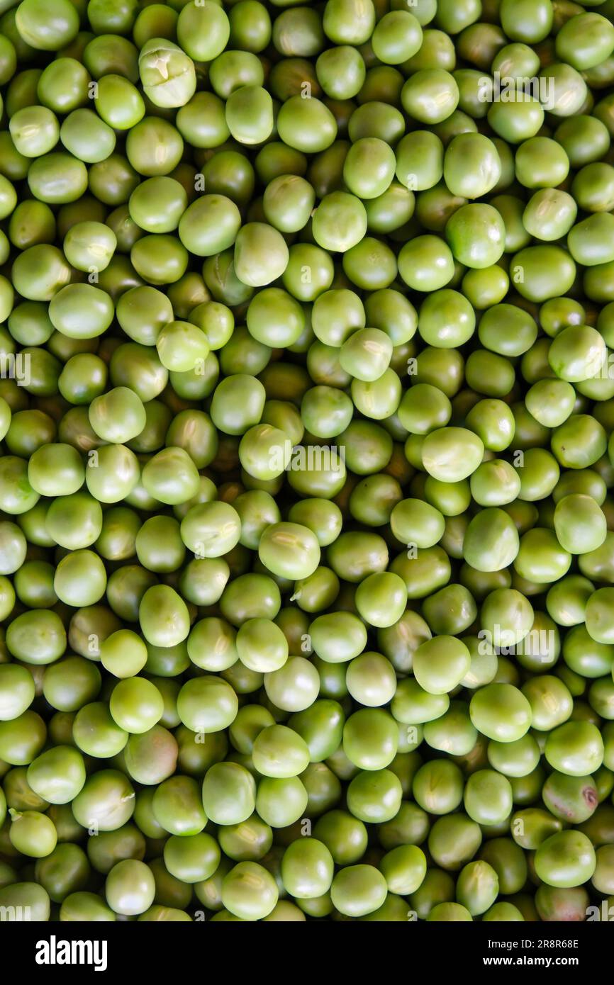 Fresh green garden peas. Top view Stock Photo - Alamy