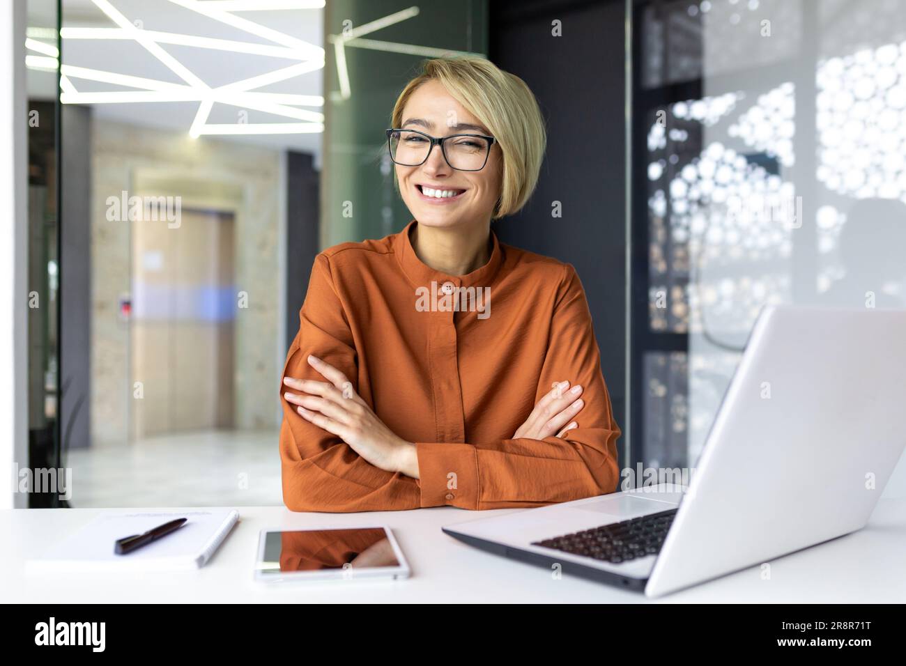Portrait of happy and successful business woman, boss in shirt smiling ...