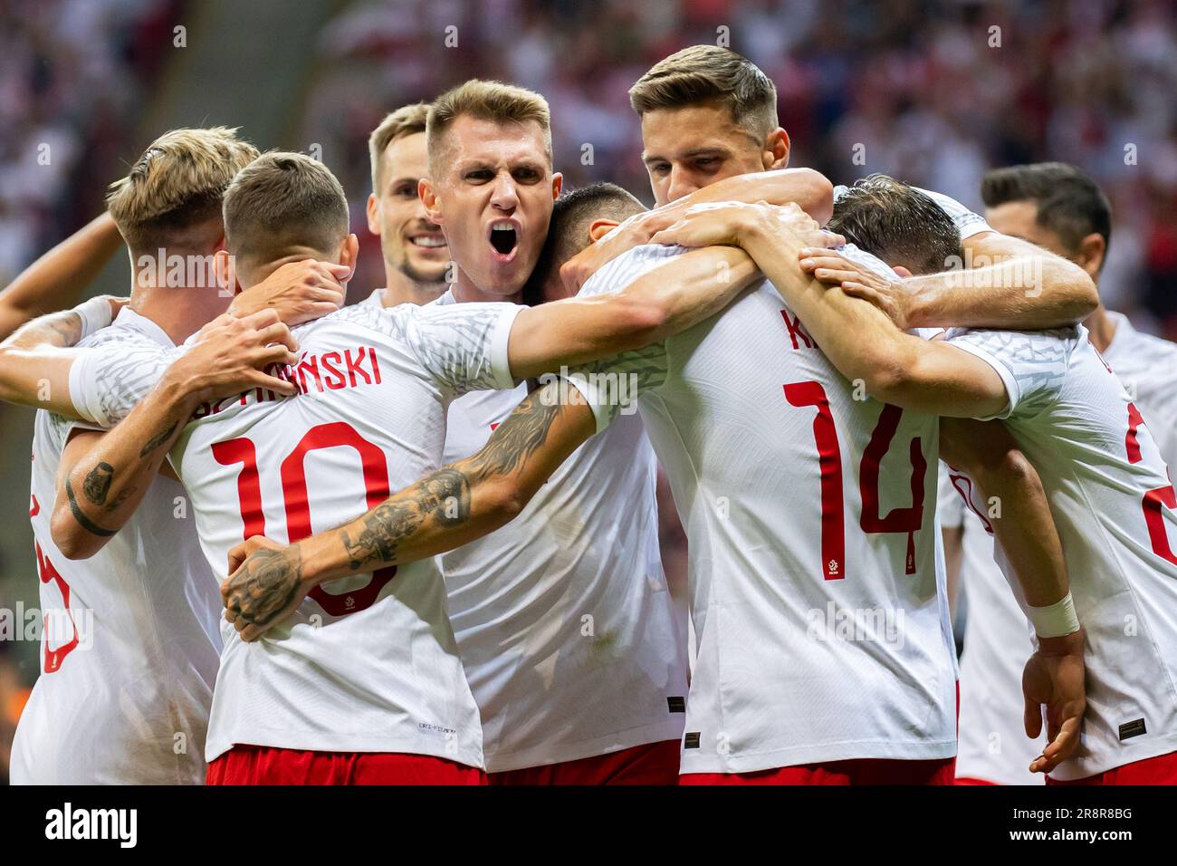 Damian Szymanski (C) of Poland celebrates a goal with teammates during ...