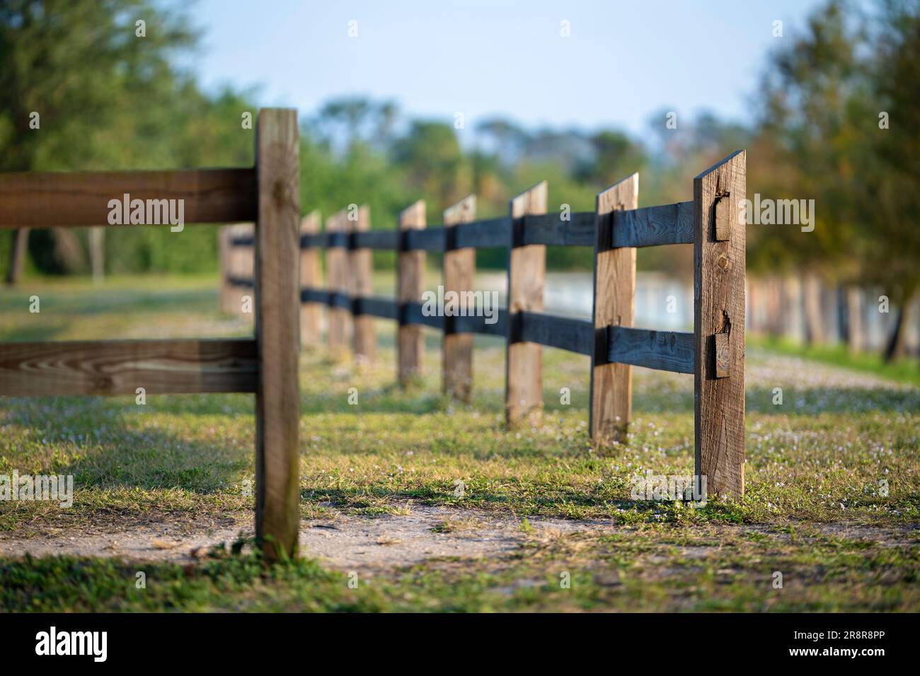 Wooden fence barrier at farm grounds for cattle and territory ...