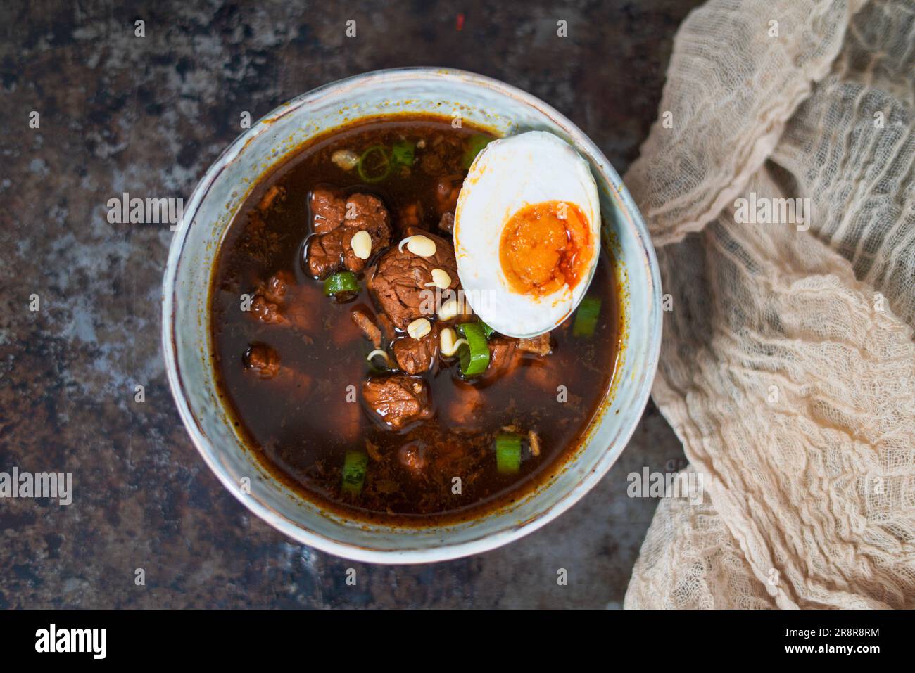 Indonesian beef black soup : Rawon Stock Photo - Alamy