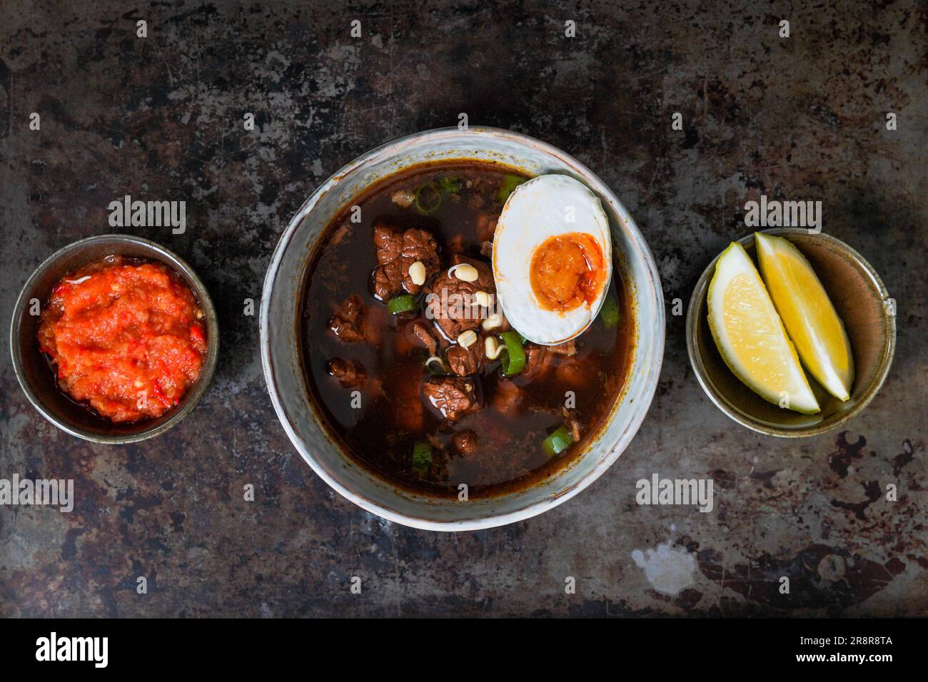 Indonesian beef black soup : Rawon Stock Photo - Alamy