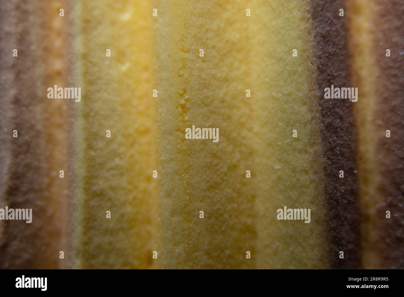 chocolate orange ice cream wave as background macro Stock Photo - Alamy