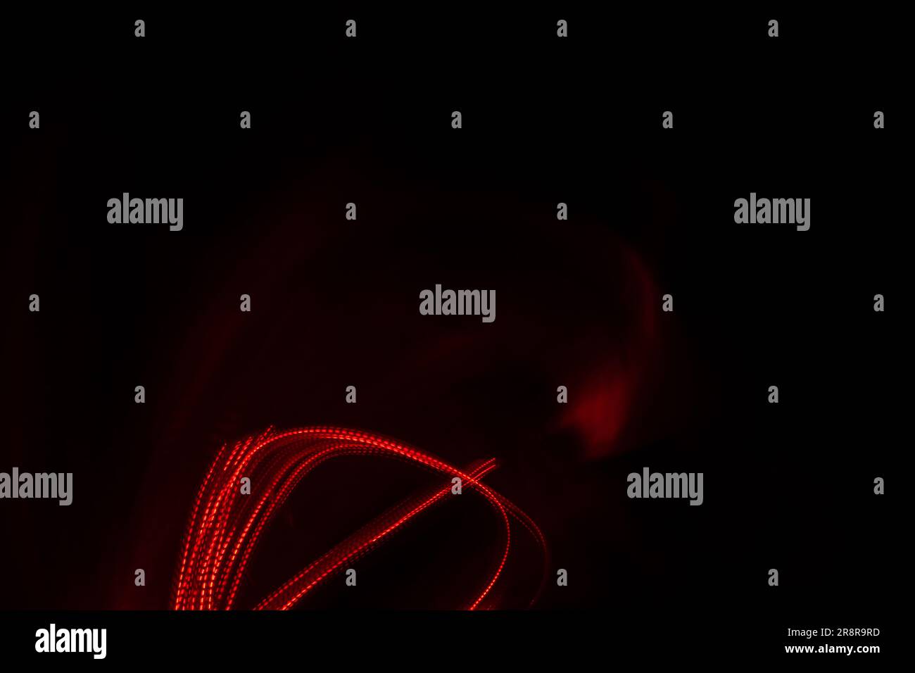 long exposure movement of a red lantern in the dark closeup Stock Photo ...