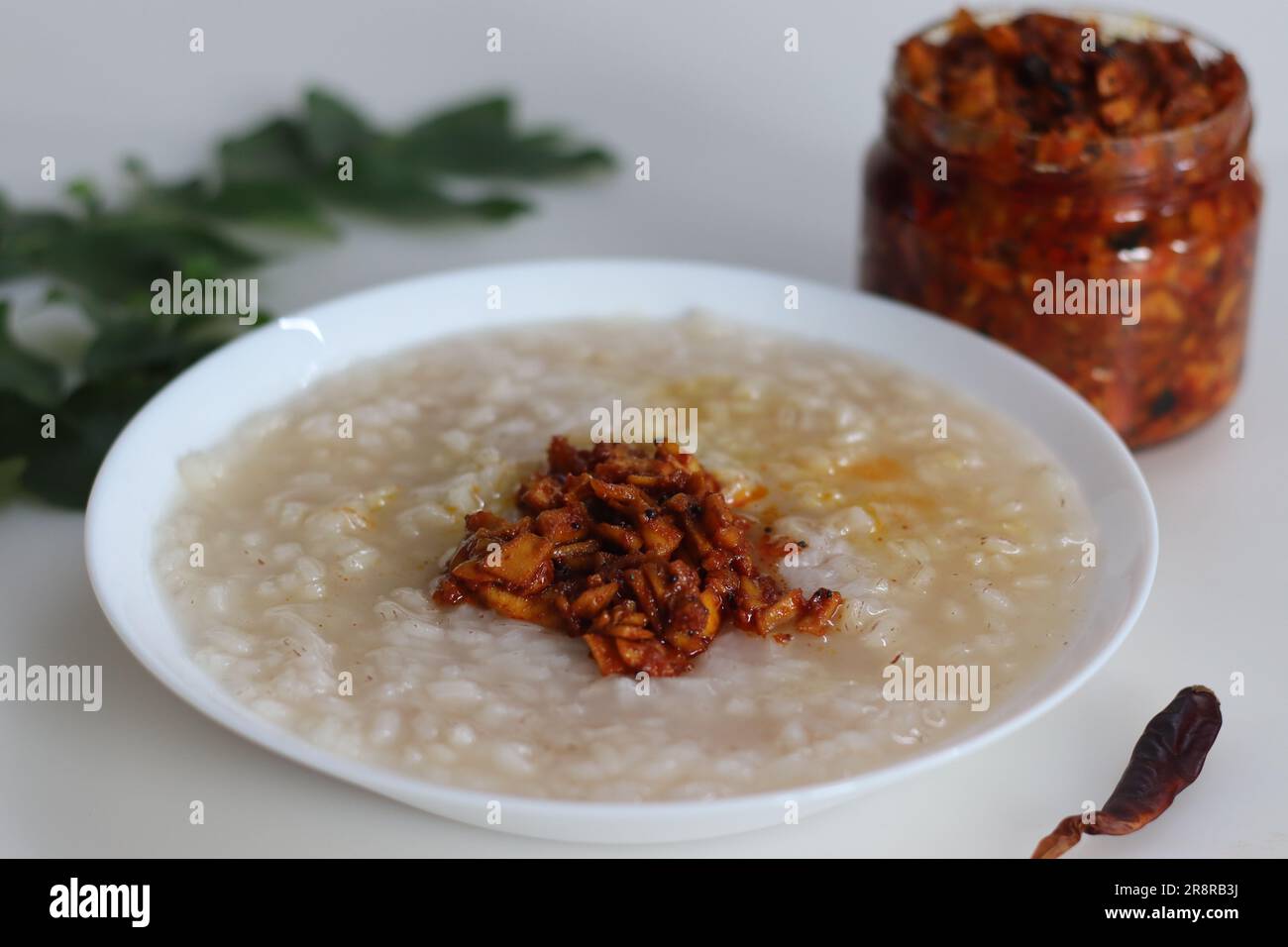 Kanji and Kadumanga. Rice gruel prepared with Kerala Matta rice. Served ...