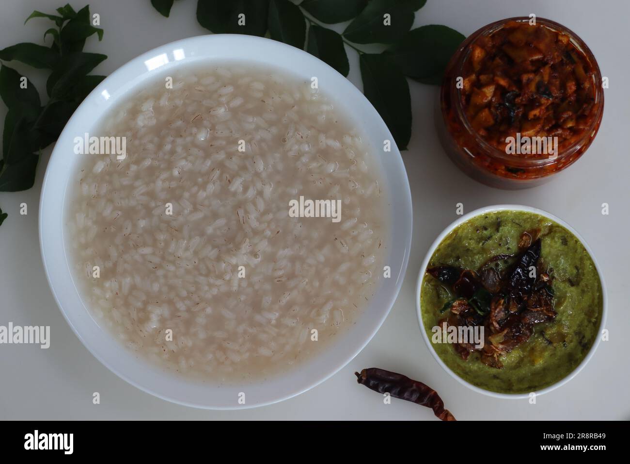 Kanji and Kadumanga. Rice gruel prepared with Kerala Matta rice. Served ...